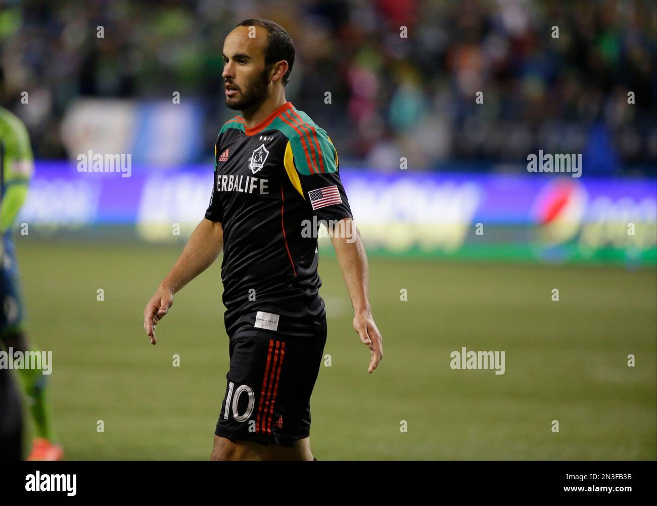 Los Angeles Galaxy midfielder Landon Donovan walks on the pitch during ...