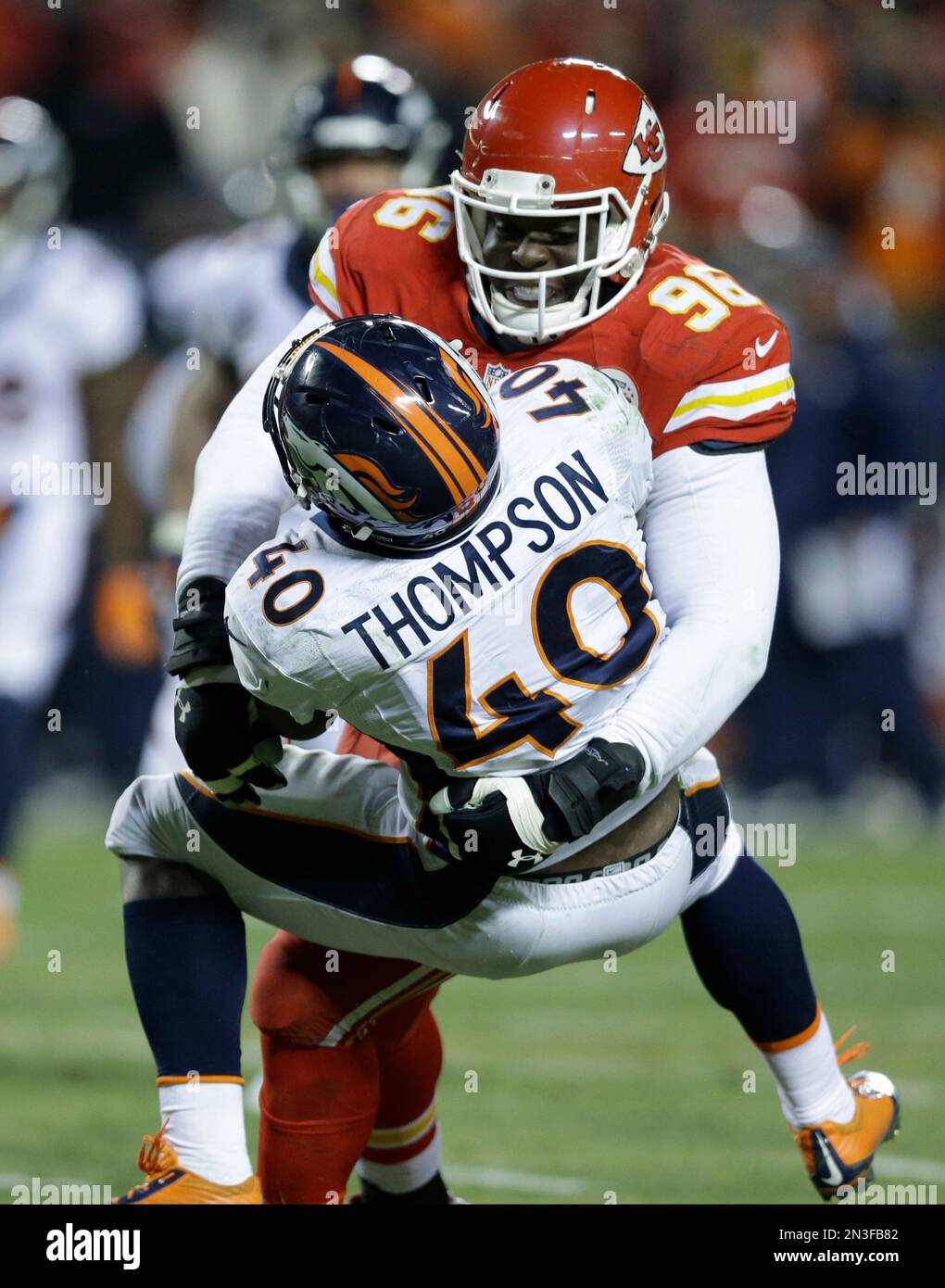 Denver Broncos running back Juwan Thompson (40) is tackled by Kansas ...