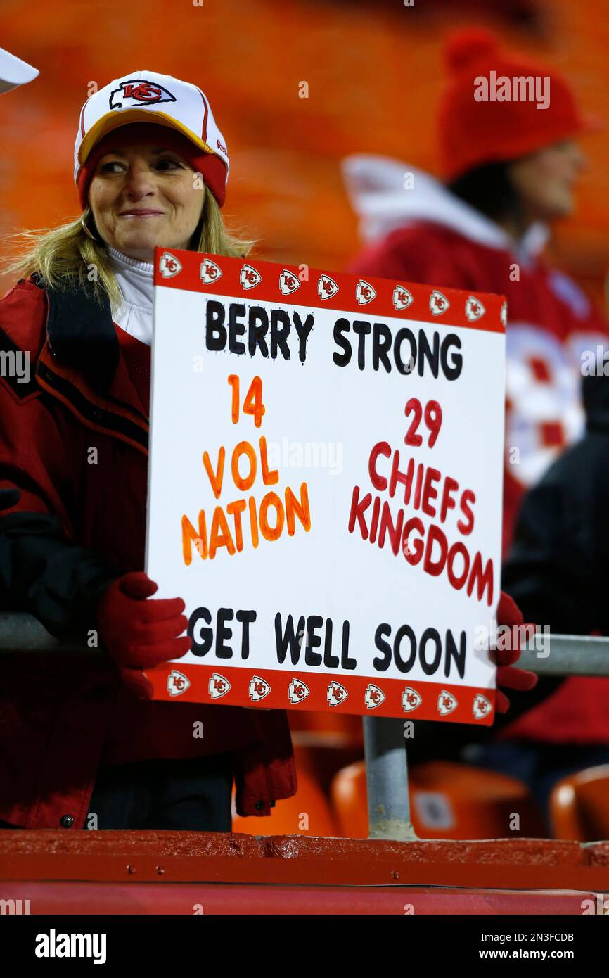 A Kansas City Chiefs fan holds a get-well sign for Kansas City Chief's ...