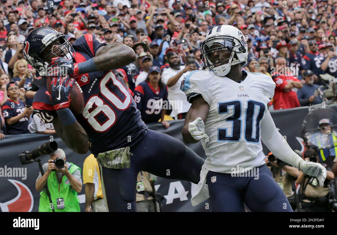 Houston Texans' Andre Johnson (80) catches a pass for a touchdown over ...