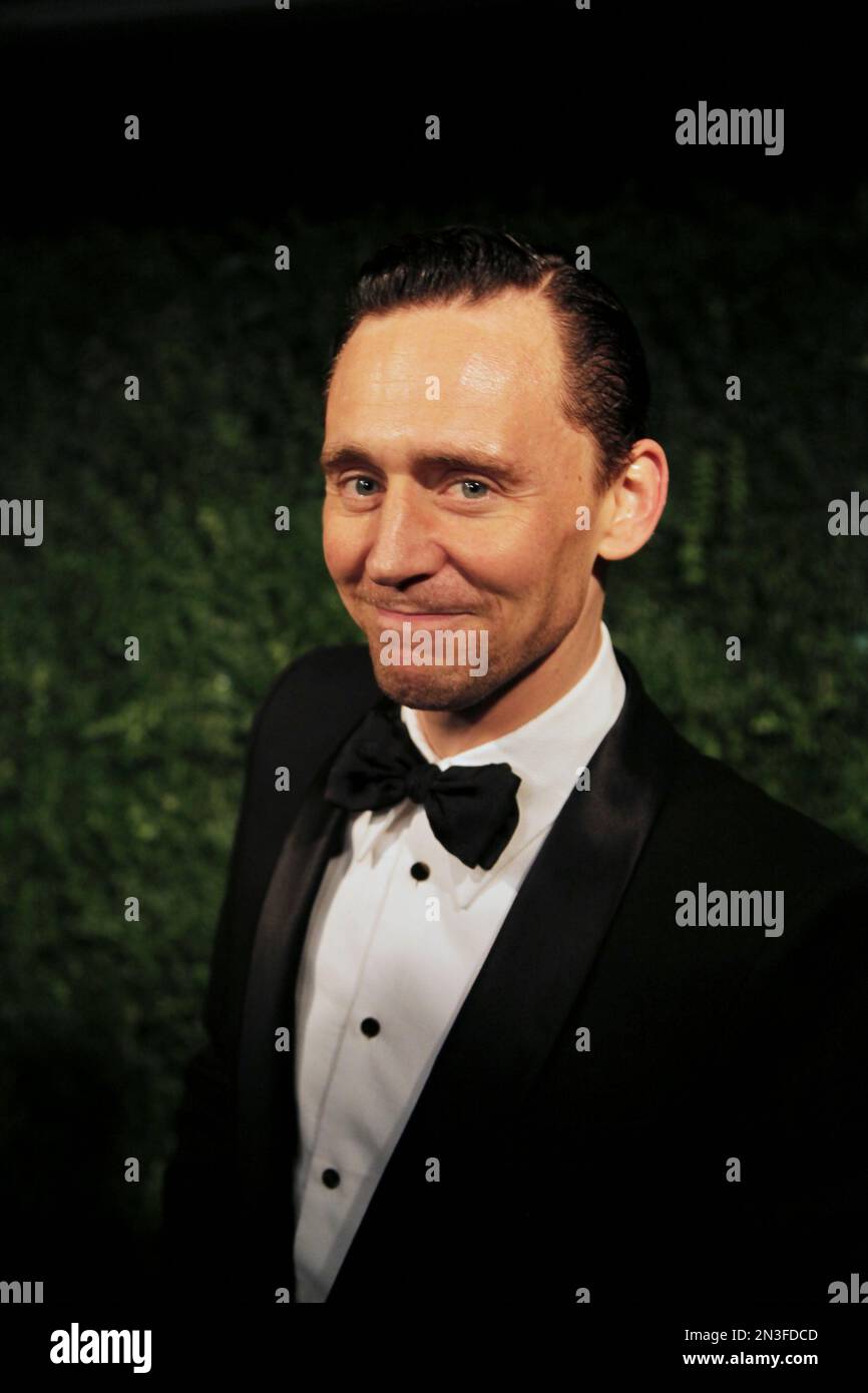 Actor Tom Hiddleston poses for photographers on arrival at the Evening ...