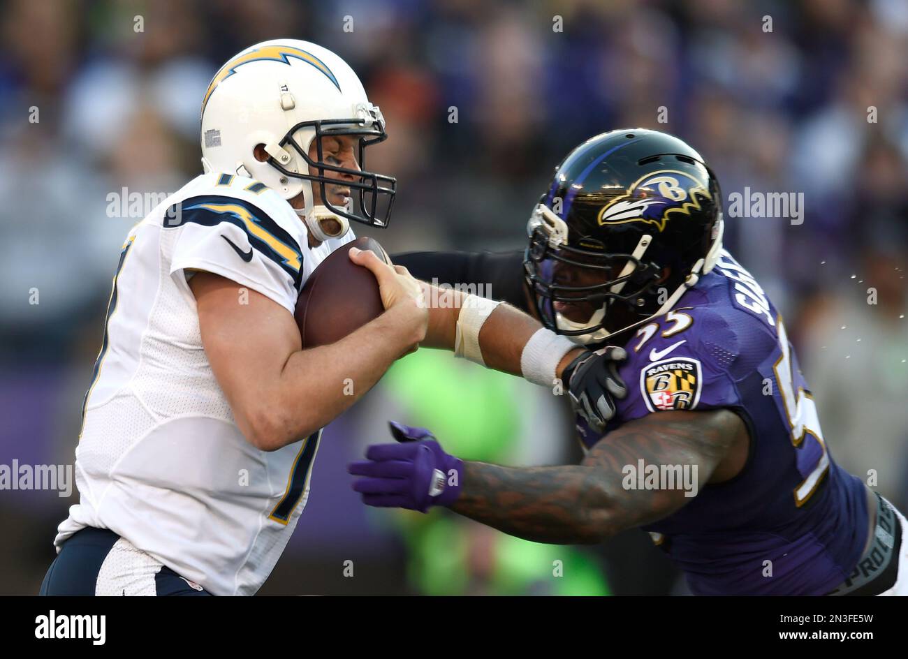 San Diego Chargers quarterback Philip Rivers, left, is sacked by ...