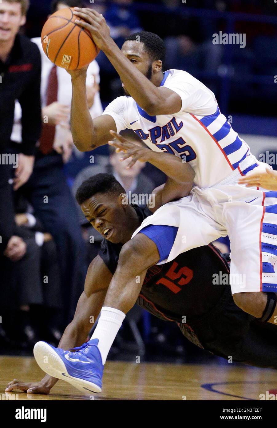 DePaul guard Durrell McDonald (25) battles for a loose ball against ...