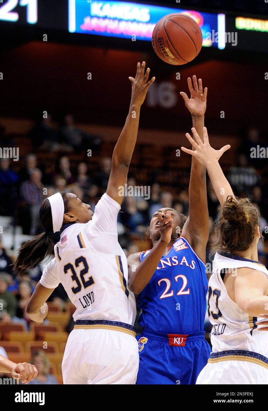 Notre Dame's Jewell Loyd (32) defends against Kansas' Chayla Cheadle ...