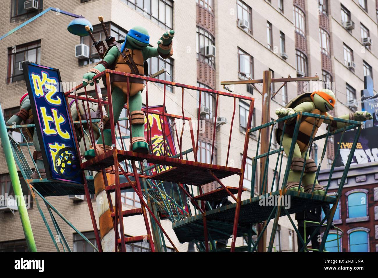 The Teenage Mutant Ninja Turtles ride a float in the Macy's ...