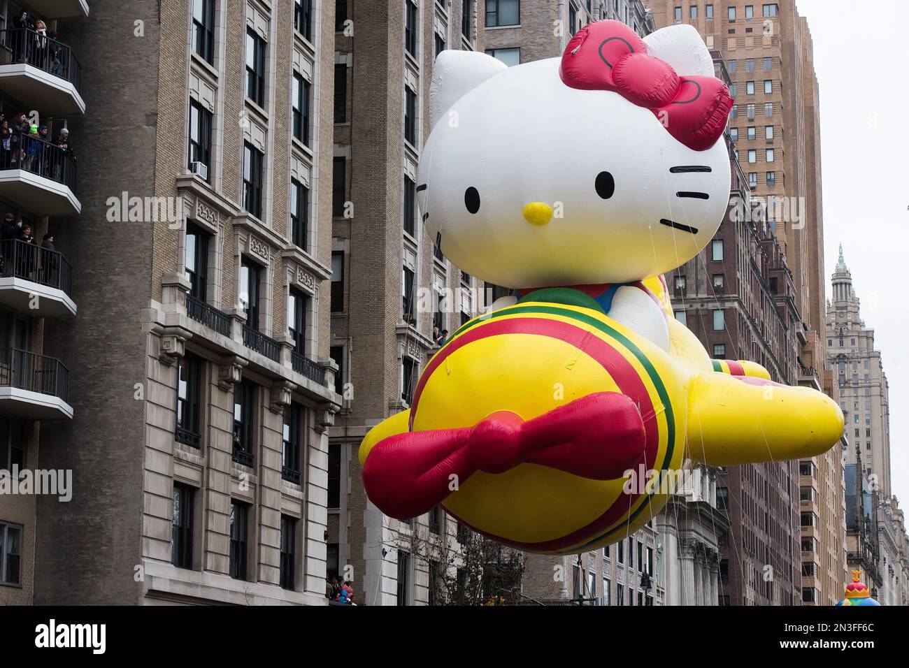The Hello Kitty balloon floats in the Macy's Thanksgiving Day Parade on ...