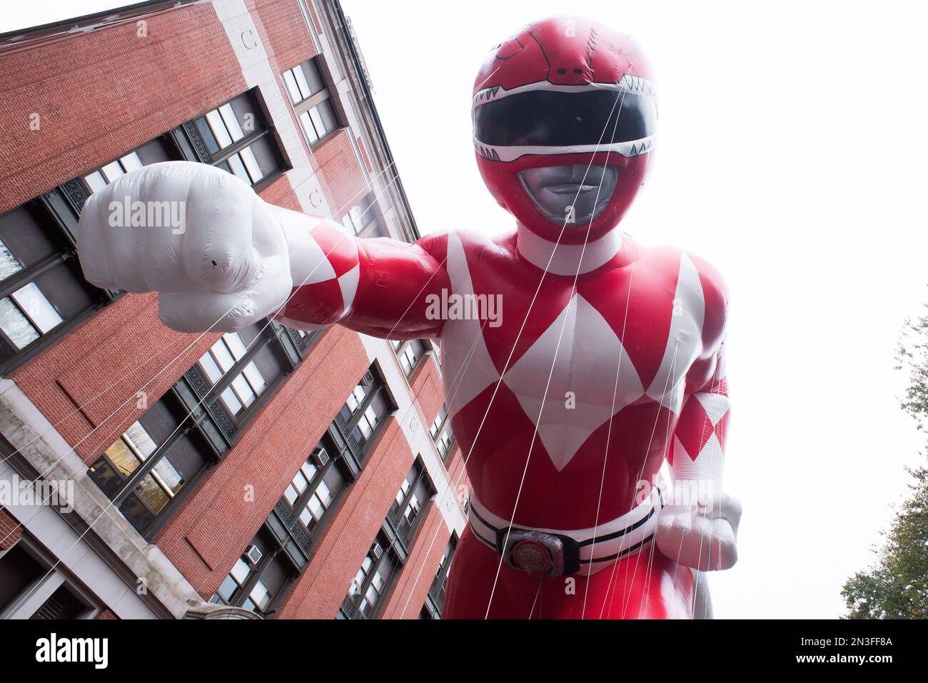 The Red Mighty Morphin Power Rangers balloon floats in the Macy's ...
