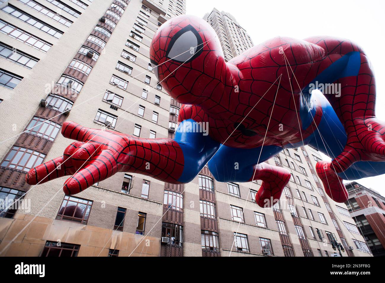 The Spider-Man balloon floats in the Macy's Thanksgiving Day Parade on ...