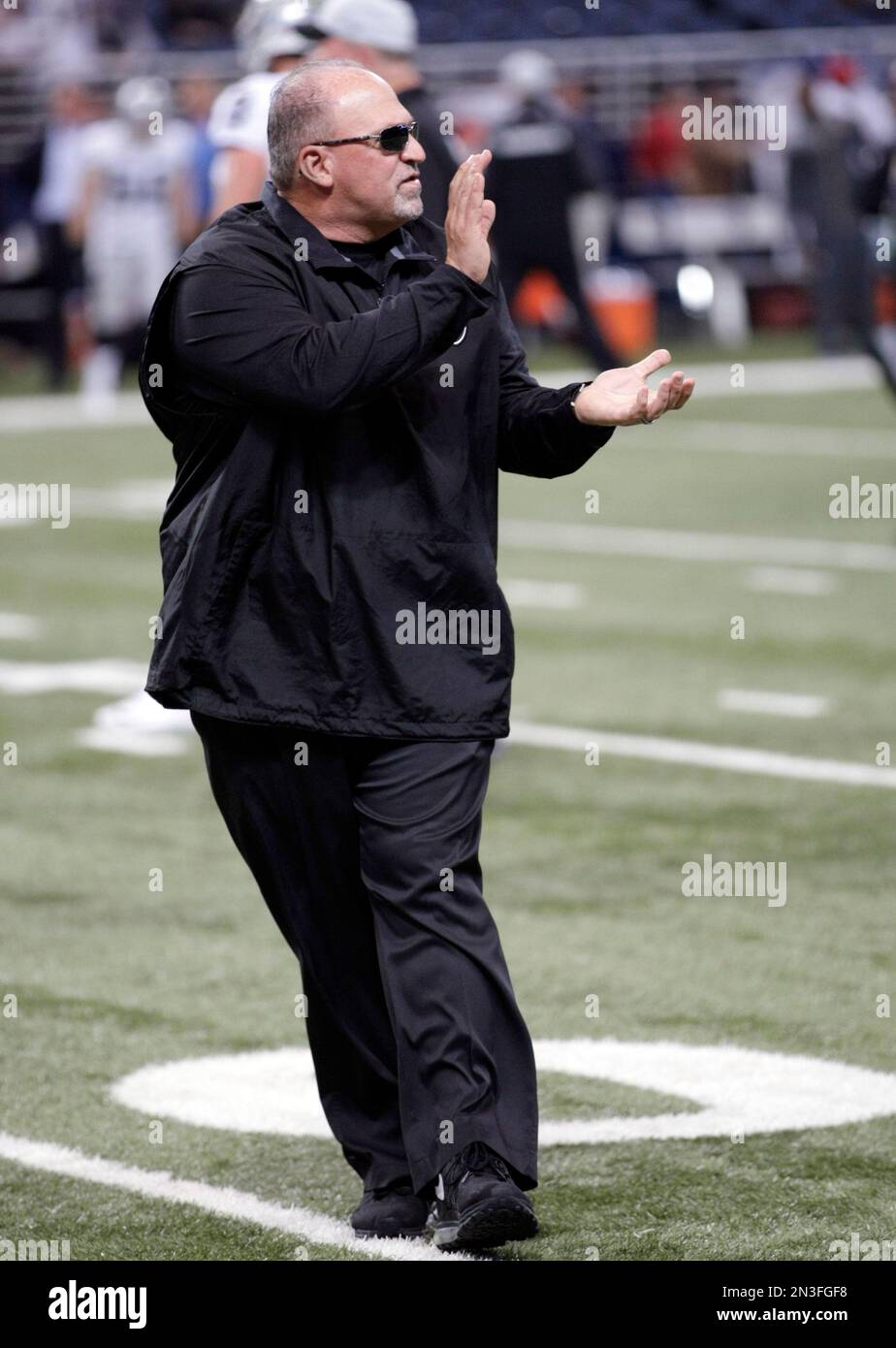 Oakland Raiders head coach Tony Sparano roams the field before the ...