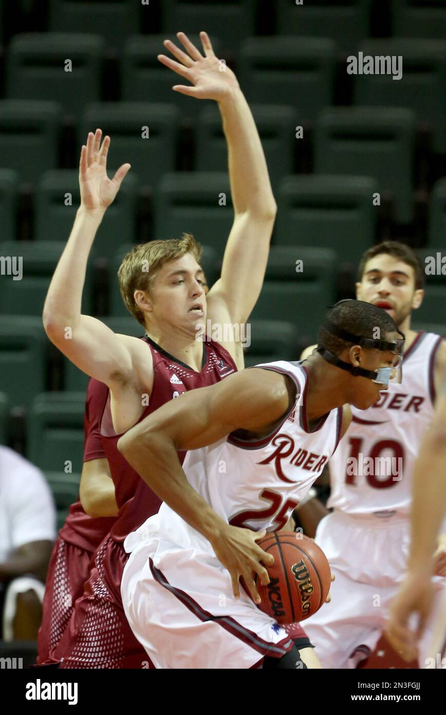 Santa Clara forward Nate Kratch (43) blocks the path of Rider forward ...