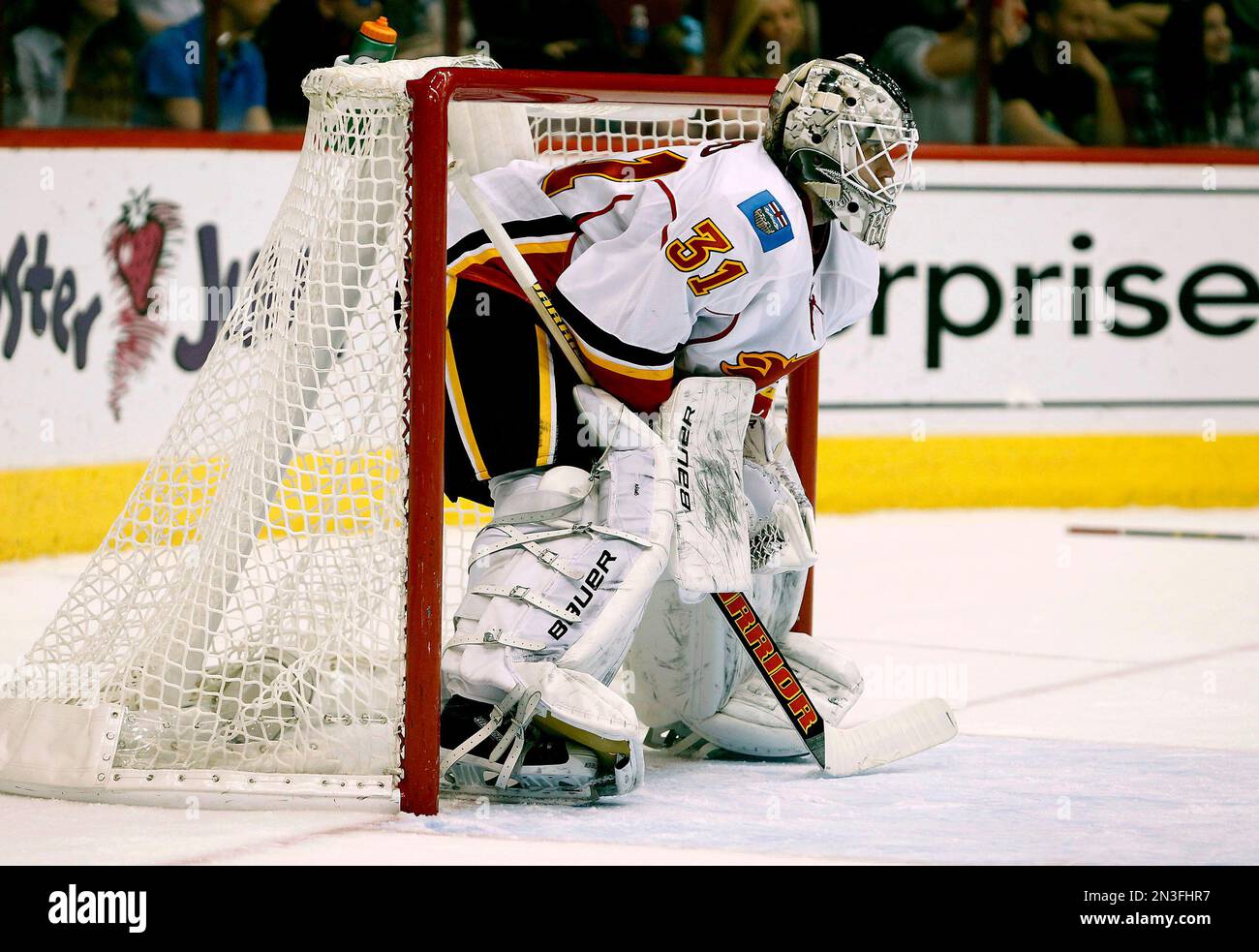 Calgary Flames goaltender Karri Ramo, of Finland, stands in goal during ...