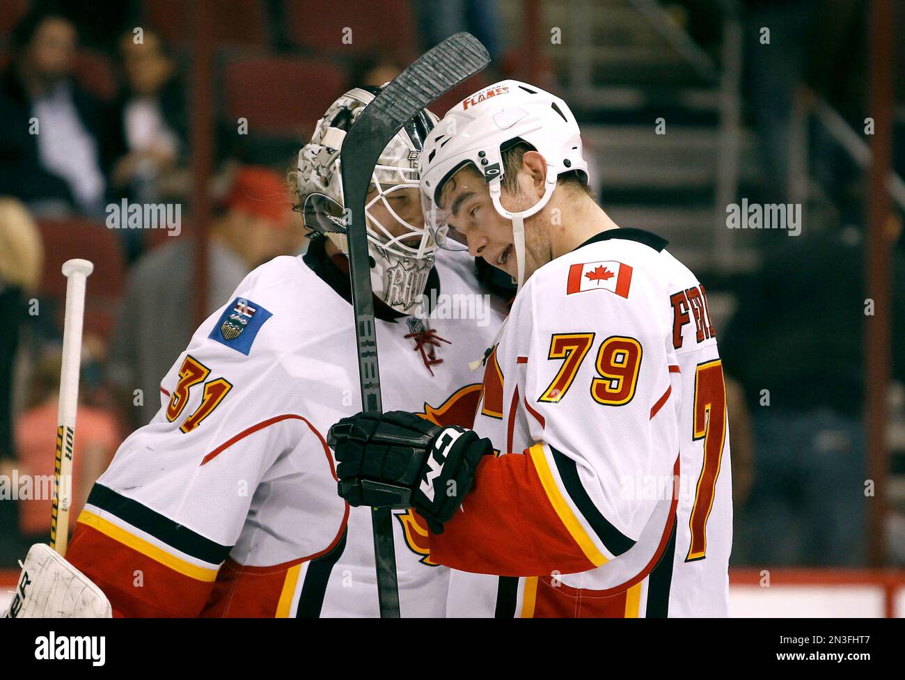 Calgary Flames goaltender Karri Ramo, of Finland (31) is congratulated ...