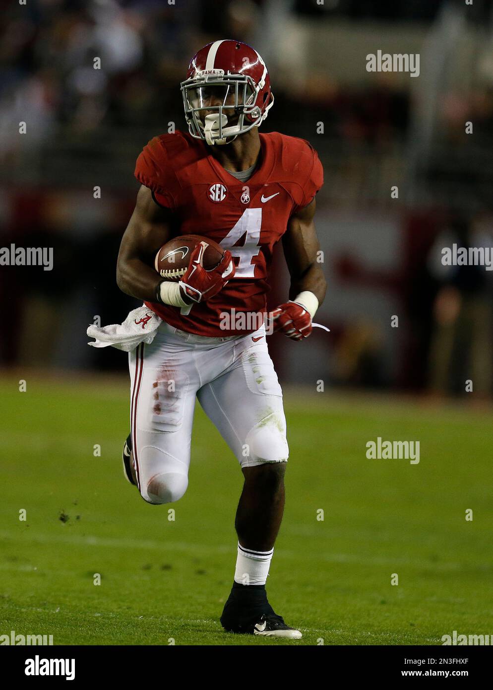 Alabama running back T.J. Yeldon (4) runs against Auburn during the ...