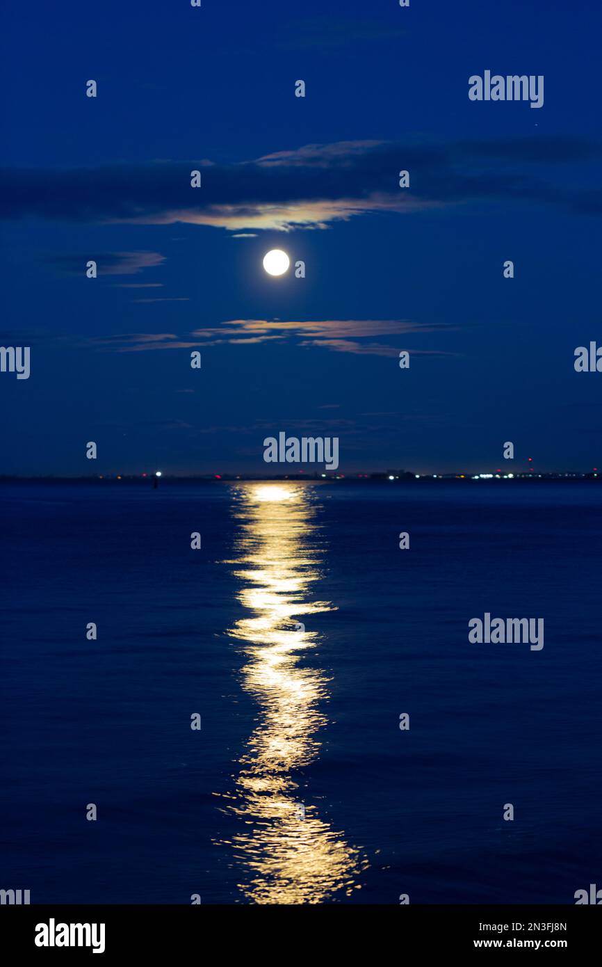 Moon over water from beach hi-res stock photography and images - Alamy