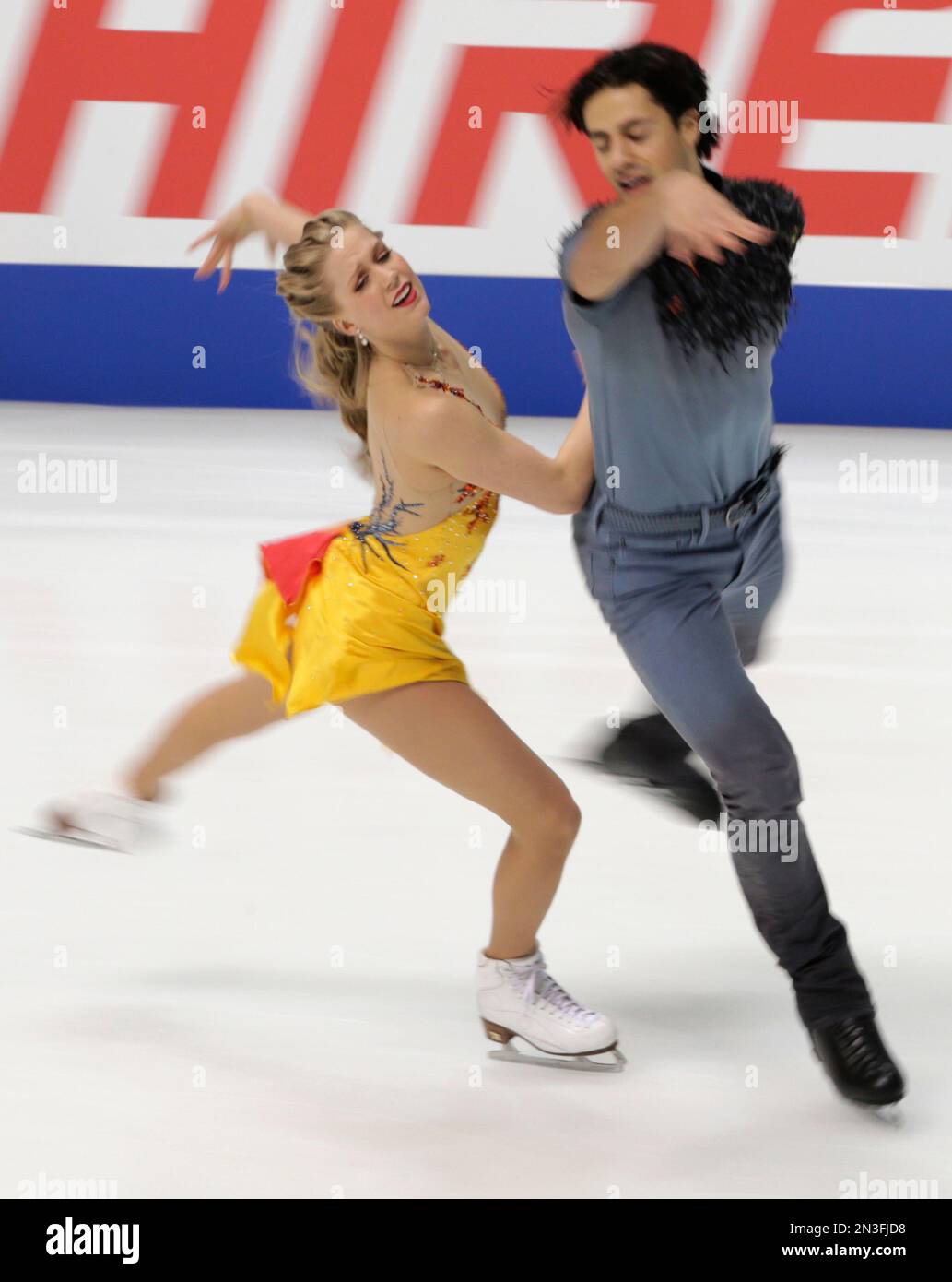 Kaitlyn Weaver and Andrew Poje of Canada perform during the Ice Dance ...