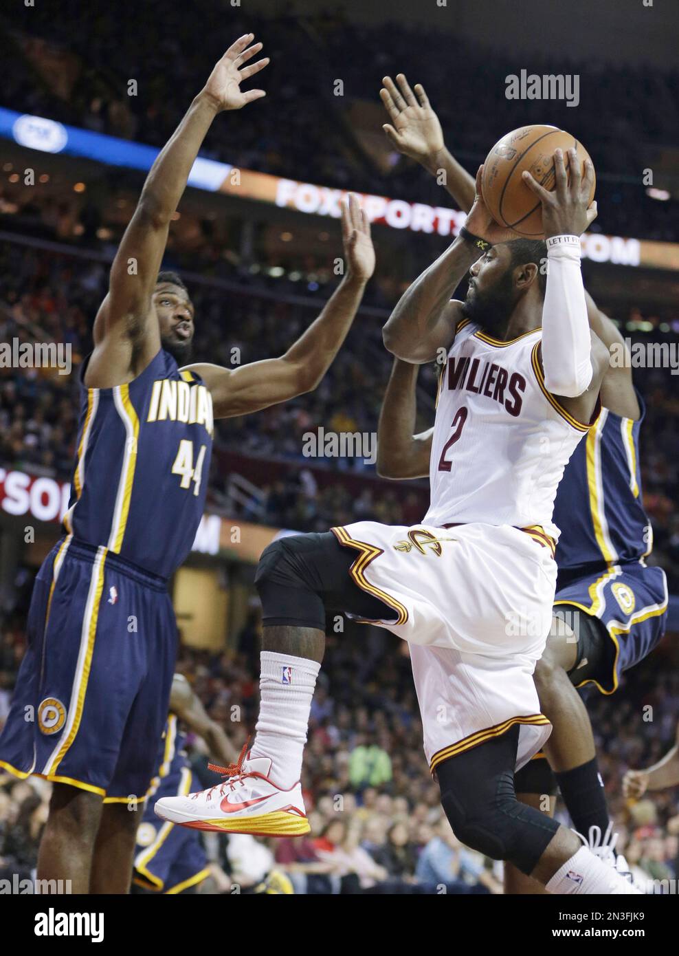 Cleveland Cavaliers' Kyrie Irving (2) drives to the basket against ...