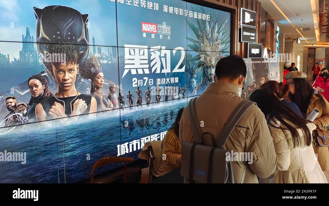 SHANGHAI, CHINA - FEBRUARY 7, 2023 - People look at posters of Marvel's ...