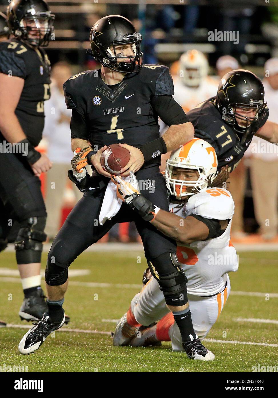 Vanderbilt quarterback Patton Robinette (4) is sacked for a 2-yard loss ...
