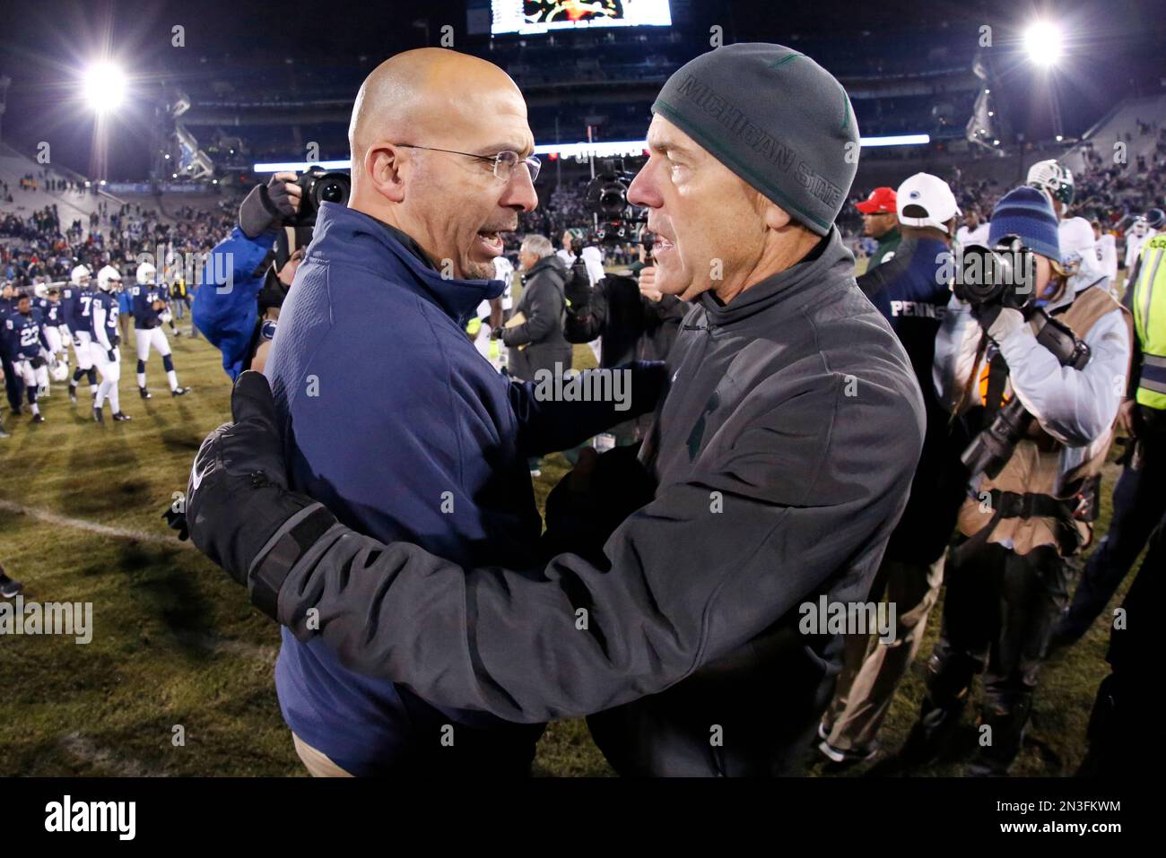Penn State head coach James Franklin, left, and Michigan State head ...