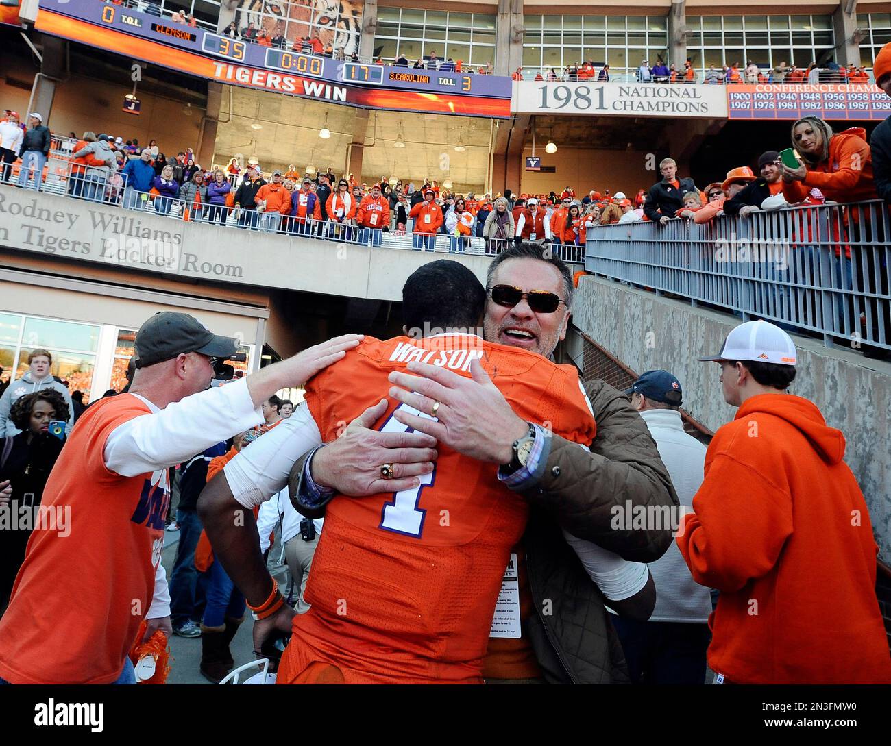 Clemson quarterback Deshaun Watson (4) is congratulated by fans as he ...