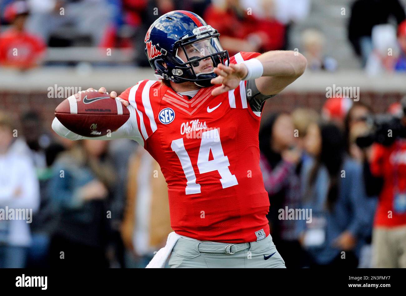 Mississippi quarterback Bo Wallace (14) releases a pass while warming ...