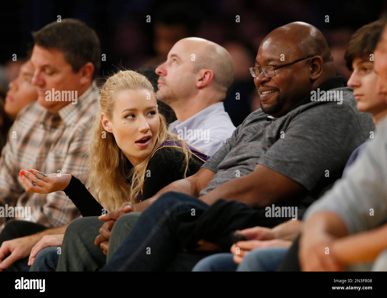 Australian recording artist Iggy Azalea sits courtside at the NBA ...