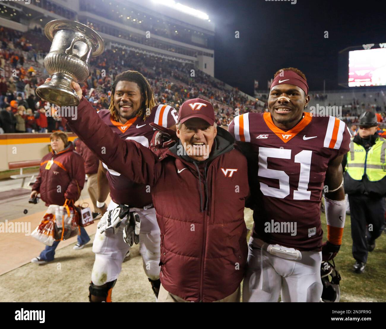 Virginia Tech head coach Frank Beamer celebrates beating Virginia with ...
