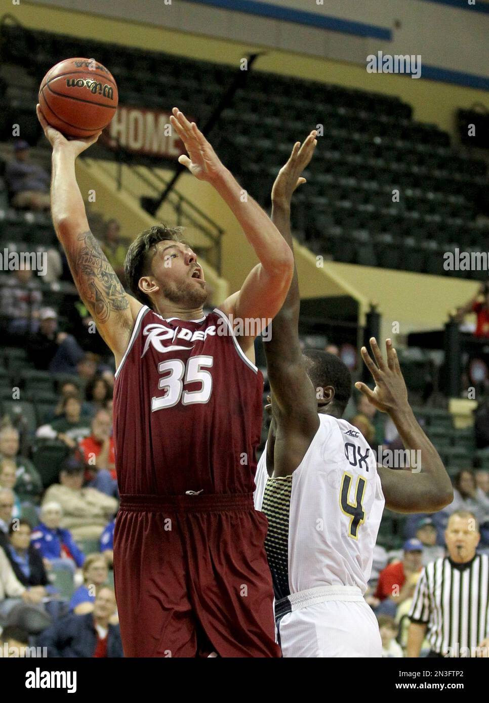 Rider center Matt Lopez (35) shoots over Georgia Tech center Demarco ...