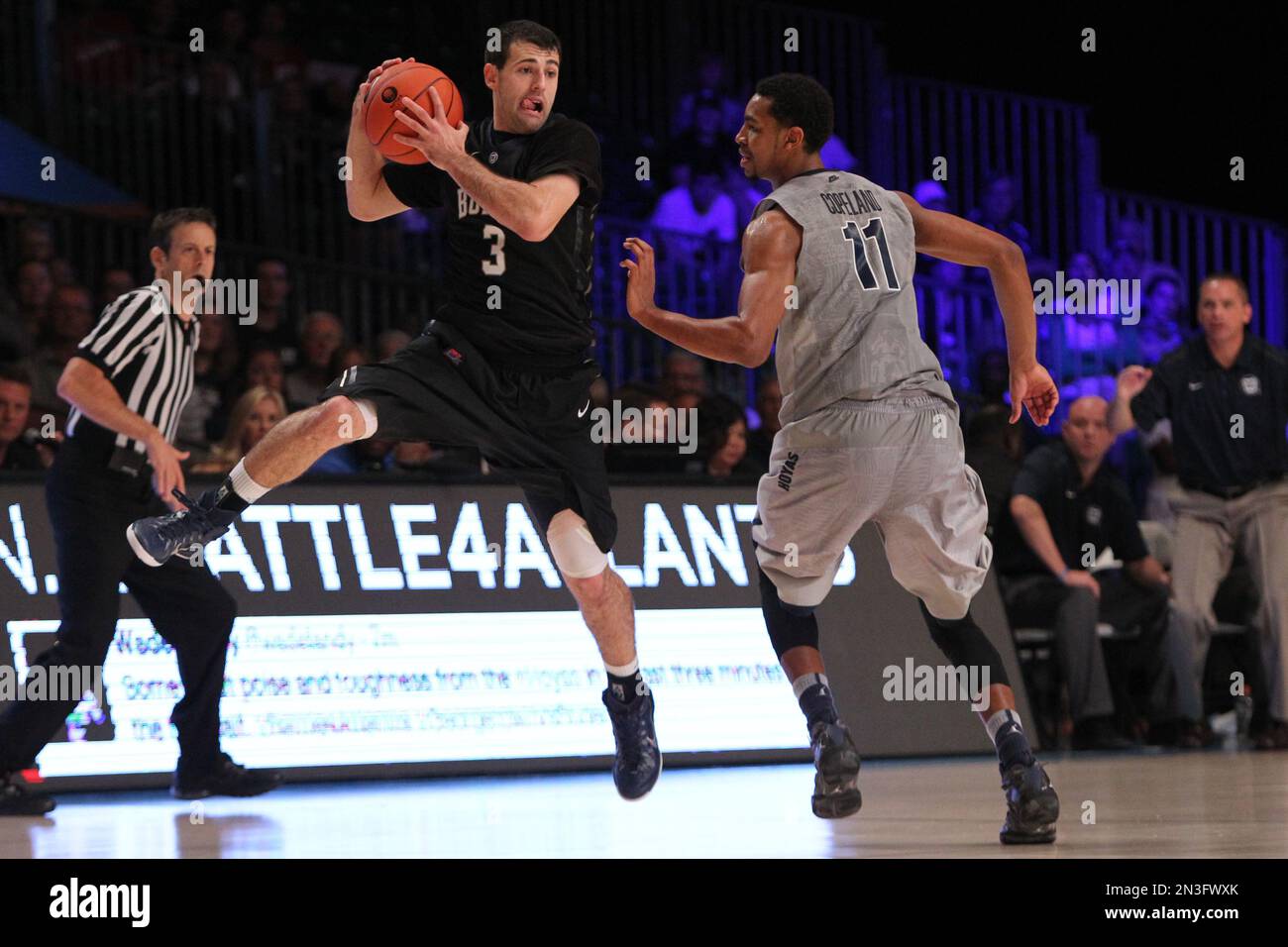 Butler's Alexander Barlow dodges Georgetown's Isaac Copeland during ...