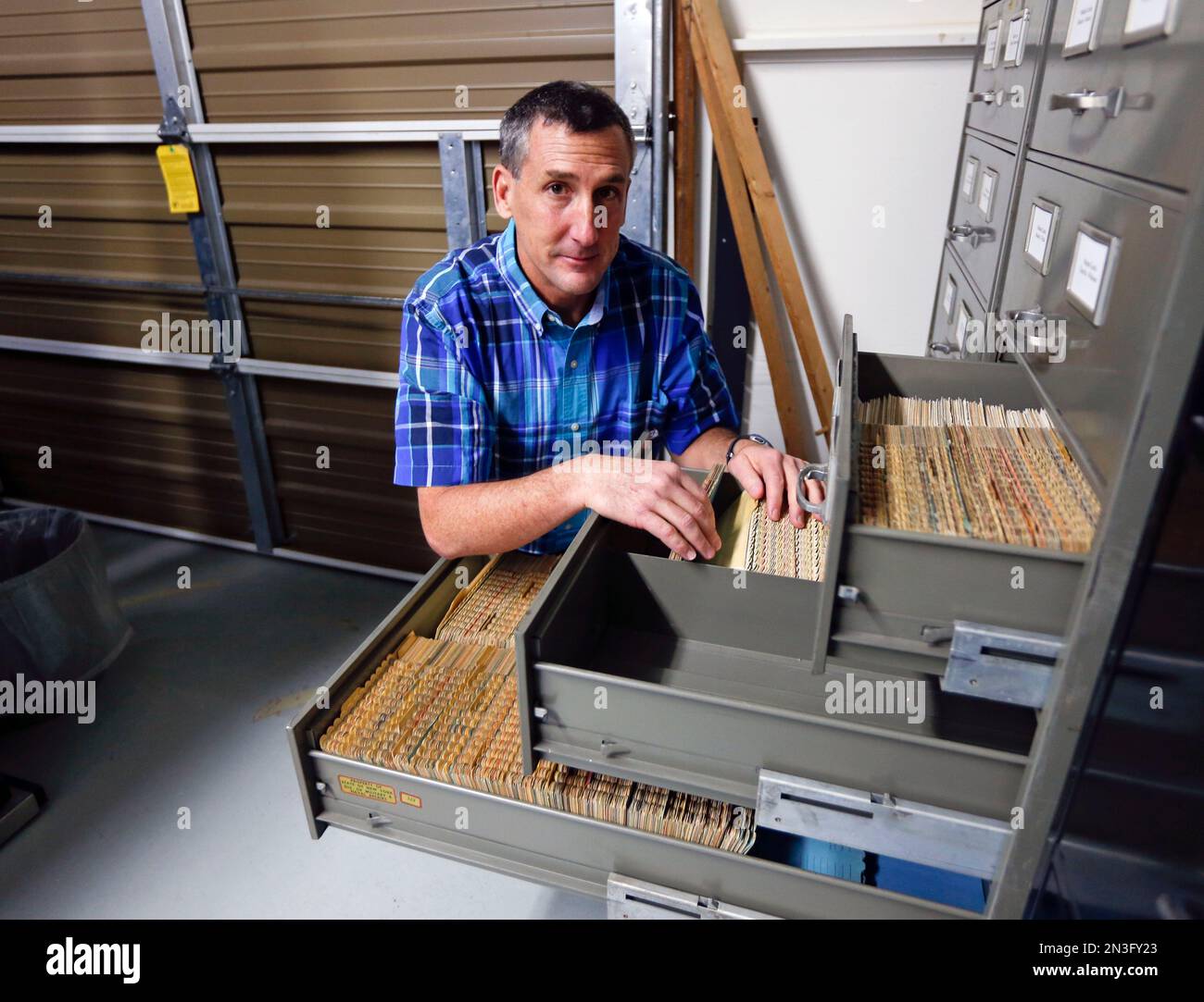 In this Tuesday, Nov. 25, 2014, photo, Jim Gandy, assistant librarian ...
