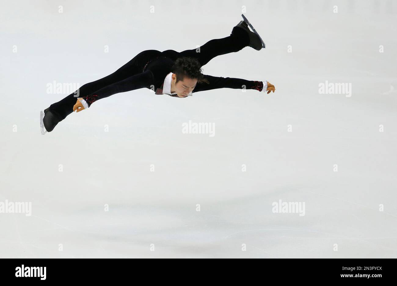Daisuke Murakami of Japan performs during the men’s short program of ...