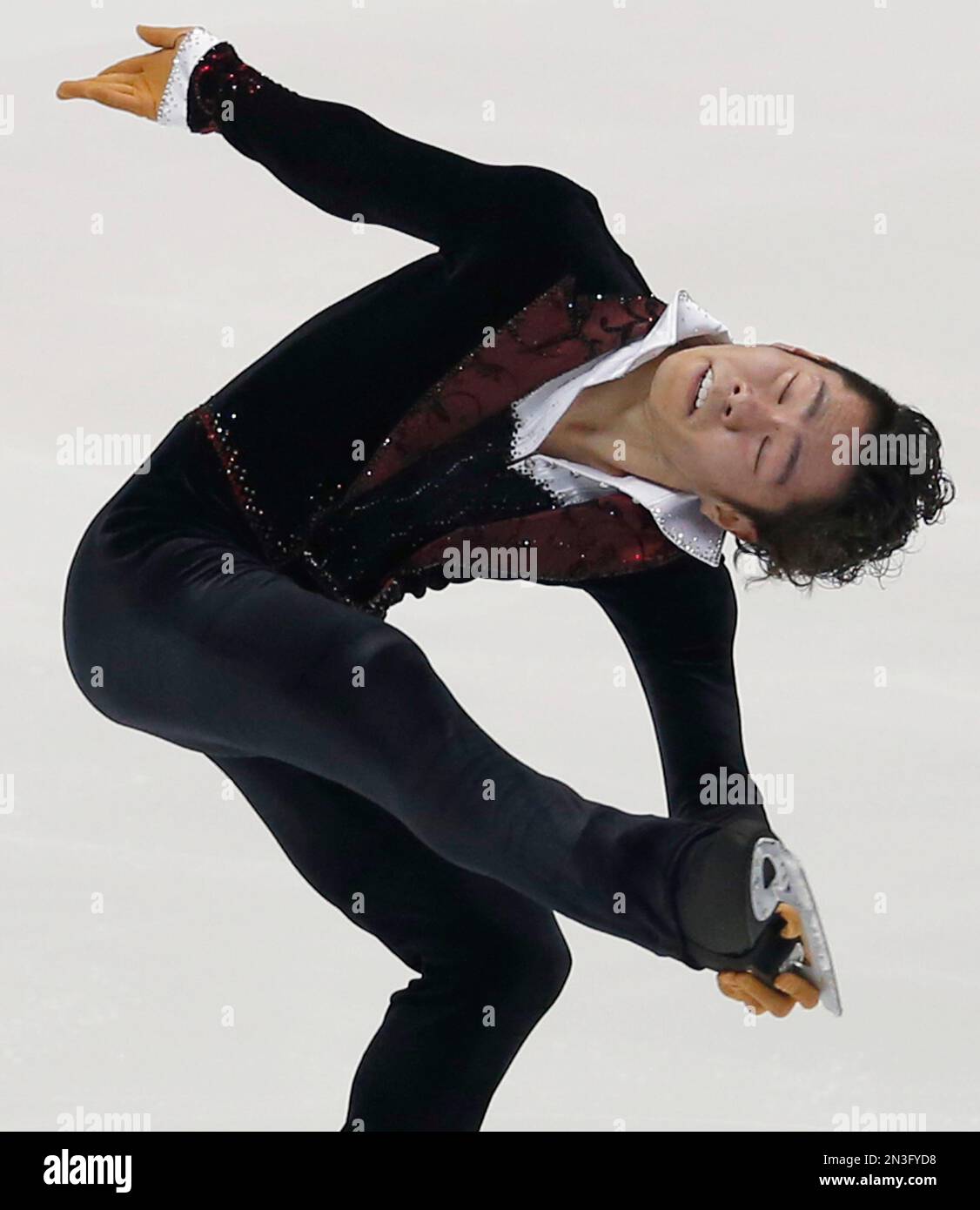 Daisuke Murakami of Japan performs during the men’s short program of the NHK Trophy figure ...