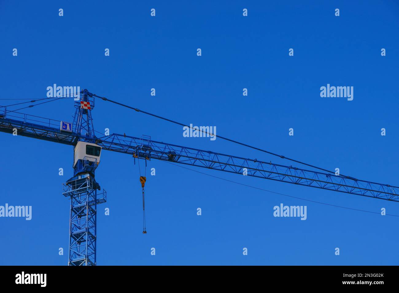 Construction cranes on sky background.Construction work. machinery and ...