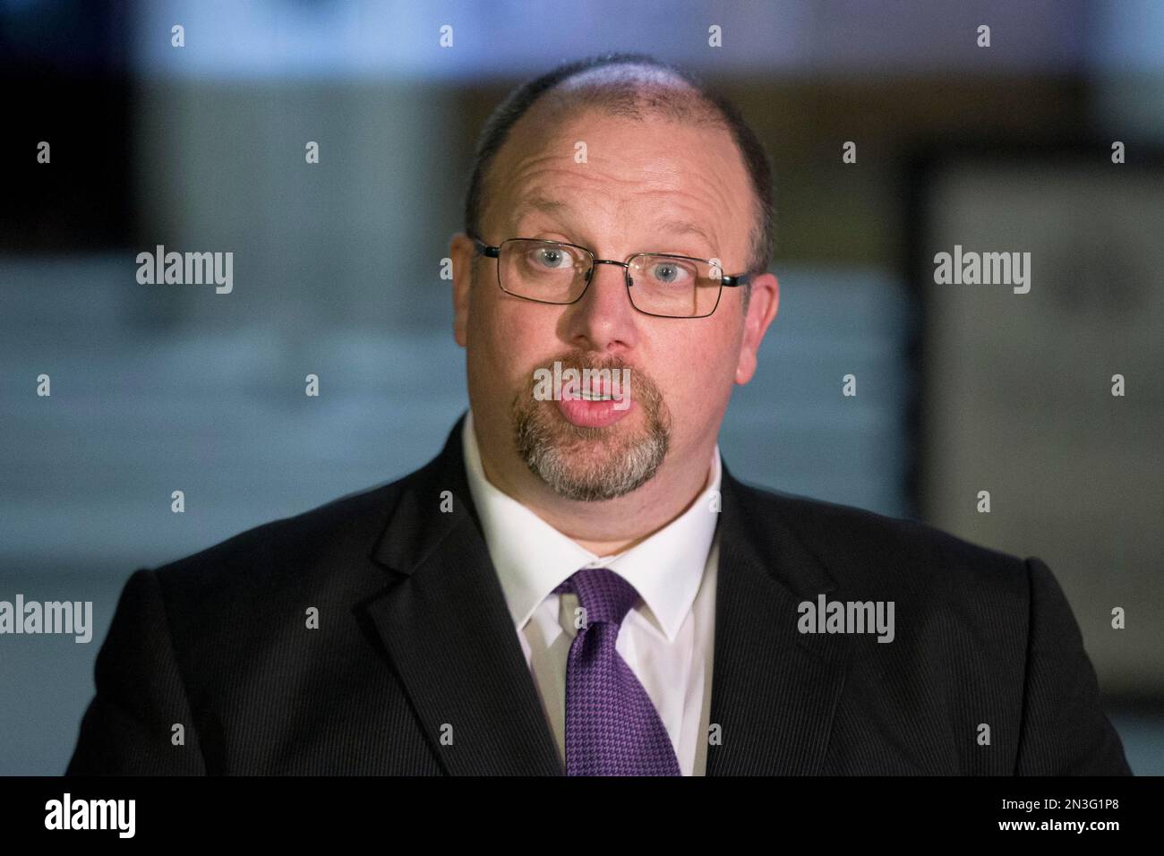 British police officer Toby Rowland speaks to the media after the ...
