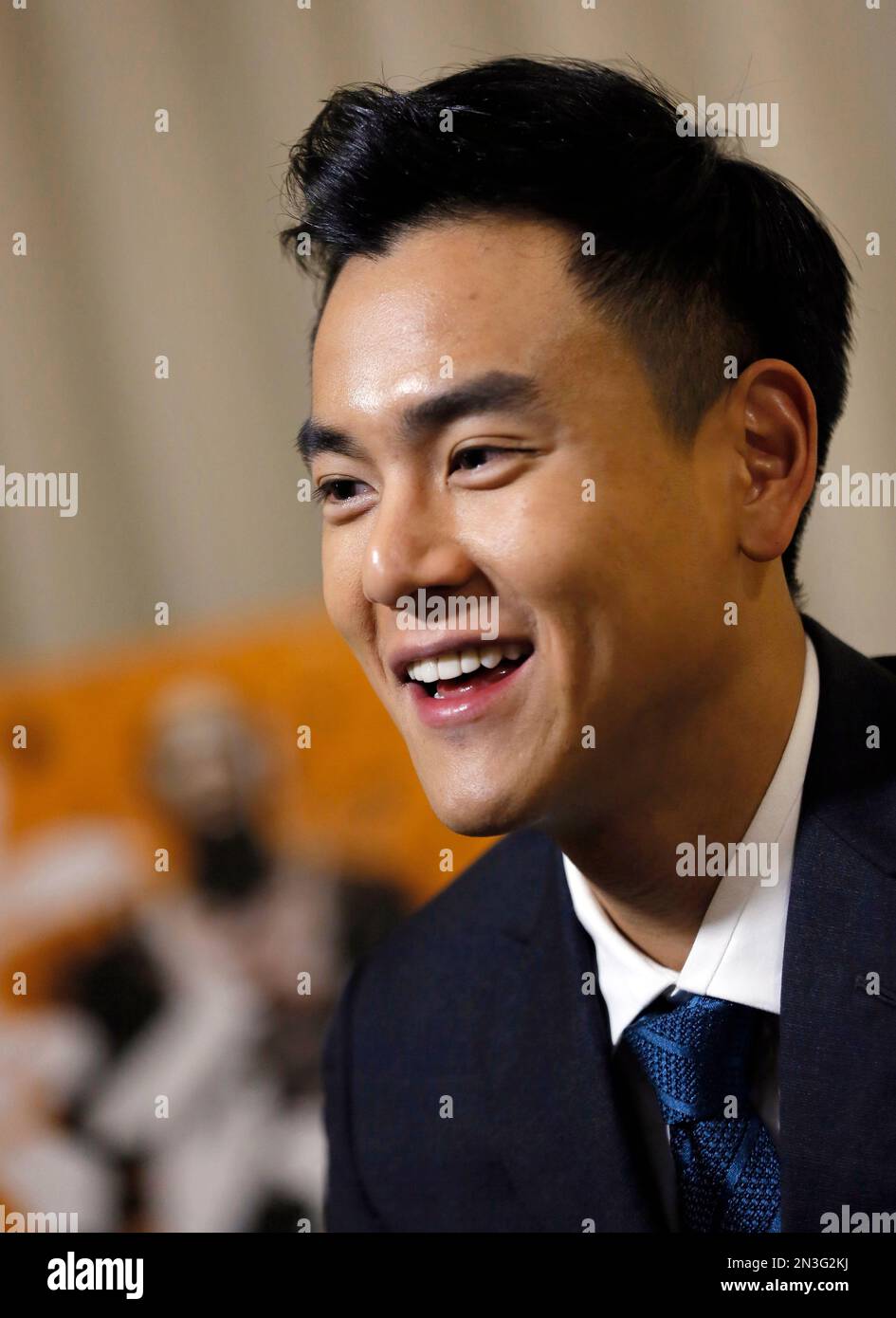 Taiwanese actor Eddie Peng answers questions during an interview for ...