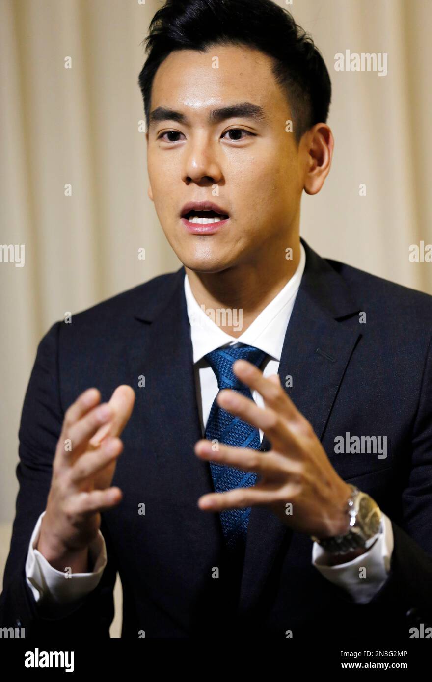 Taiwanese actor Eddie Peng answers questions during an interview for ...