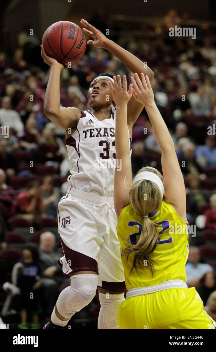 Texas A&M's Courtney Walker (33) shoots over McNeese State's Hannah ...
