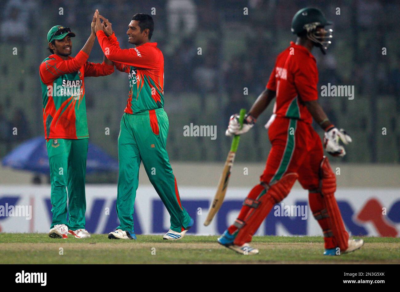 Bangladesh's Anamul Haque, left, congratulates teammate Mahmudullah for ...