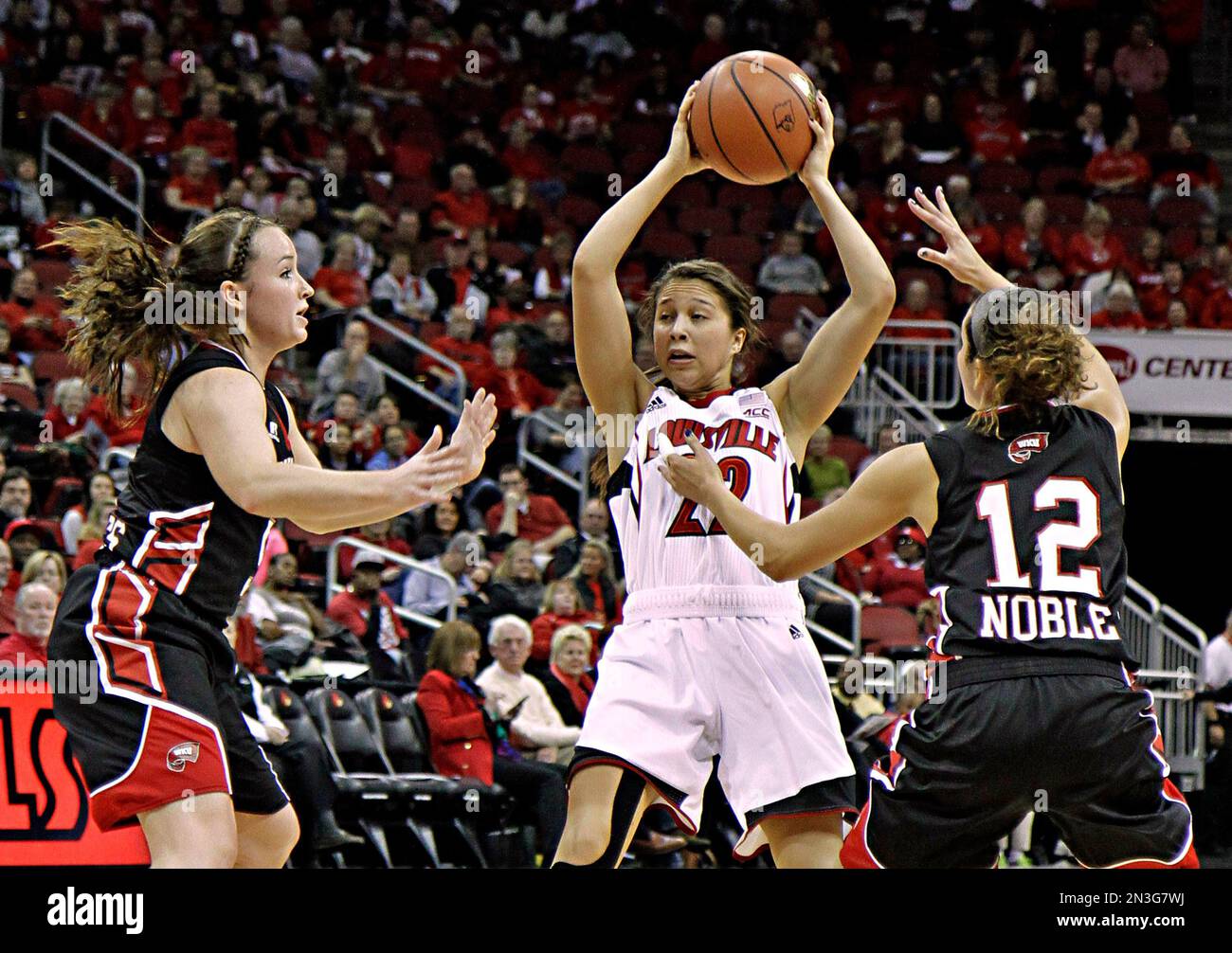 Louisville guard Jude Schimmel (22) looks to pass as Western Kentucky's ...