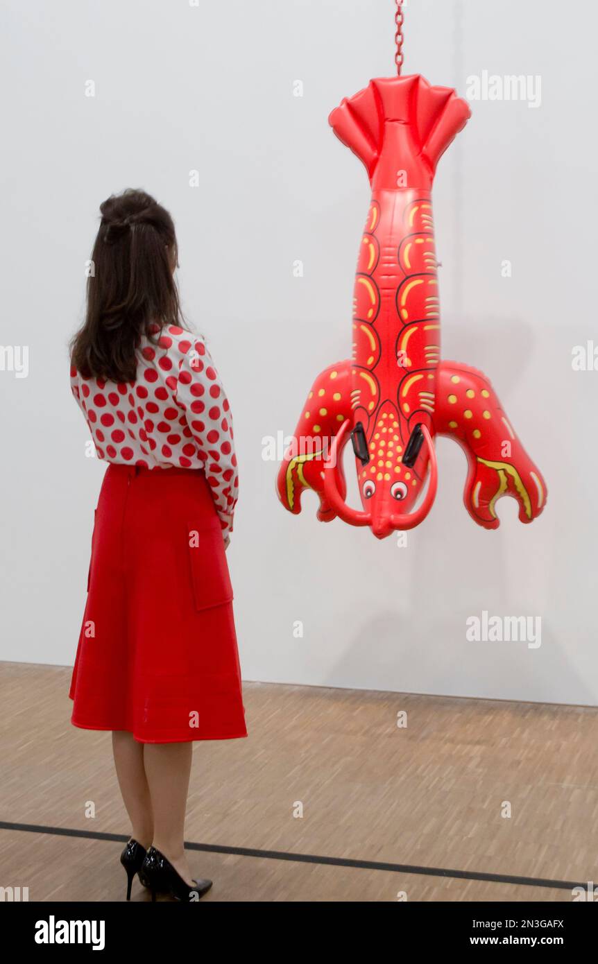 A visitors looks at "Lobster", by artist Jeff Koons of the United ...