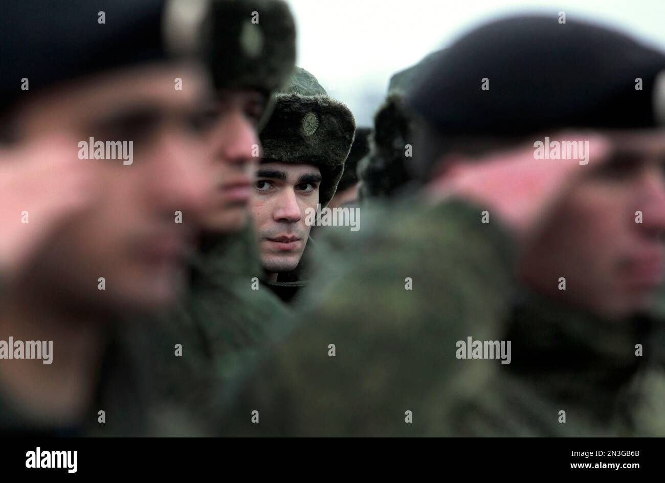 FILE - In this Monday, Nov. 17, 2014, file photo, conscripts stand at a ...