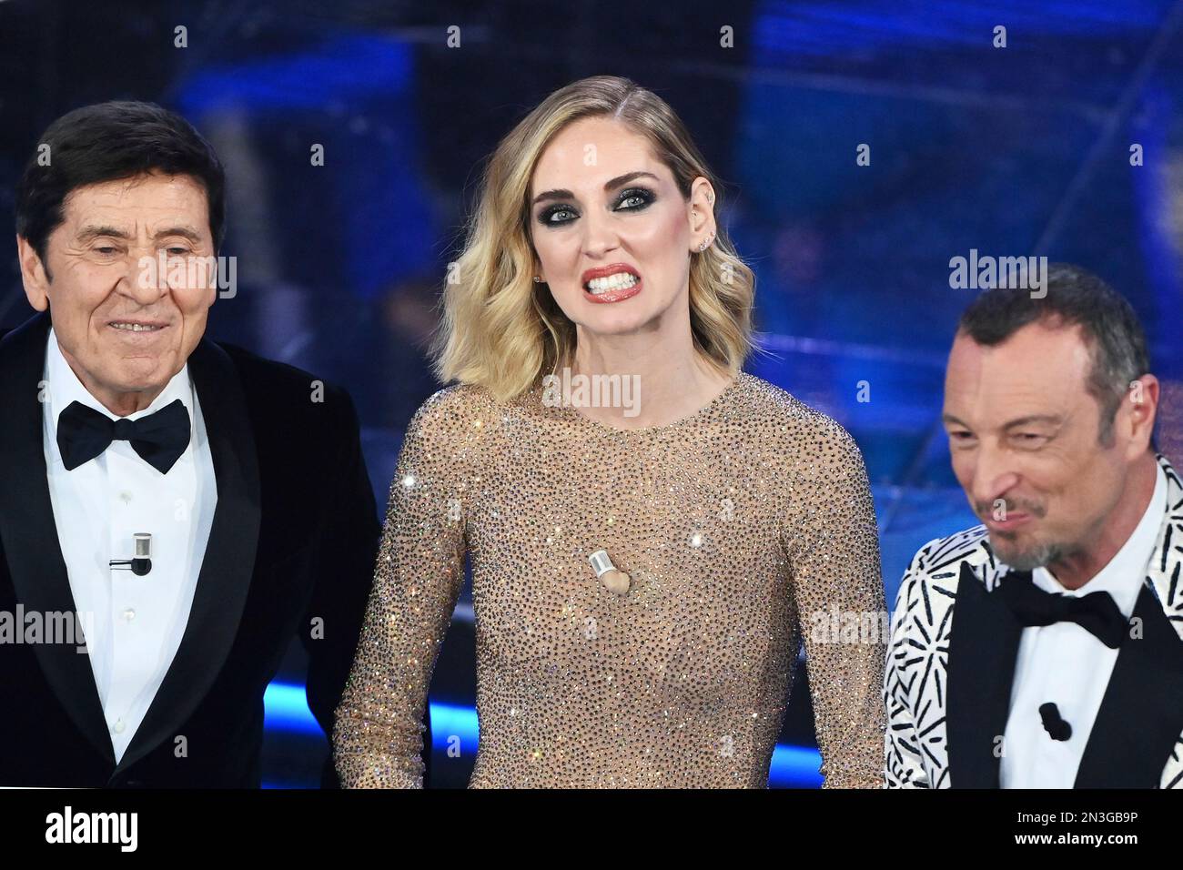 From left, Gianni Morandi, Chiara Ferragni and Amadeus attend the first ...