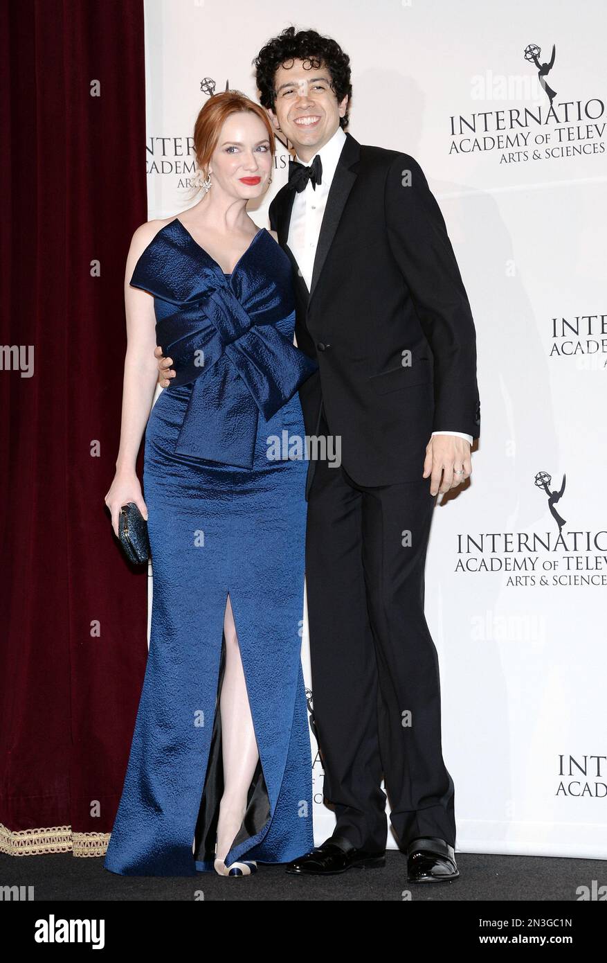 Actress Christina Hendricks and husband Geoffrey Arend pose in the ...