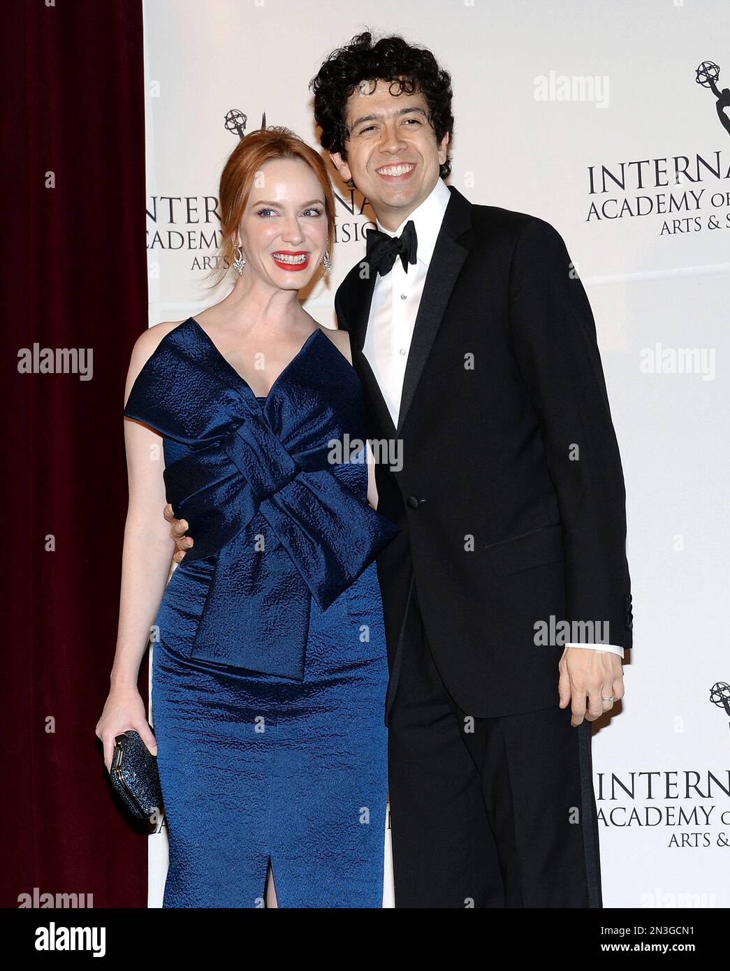 Actress Christina Hendricks and husband Geoffrey Arend pose in the ...