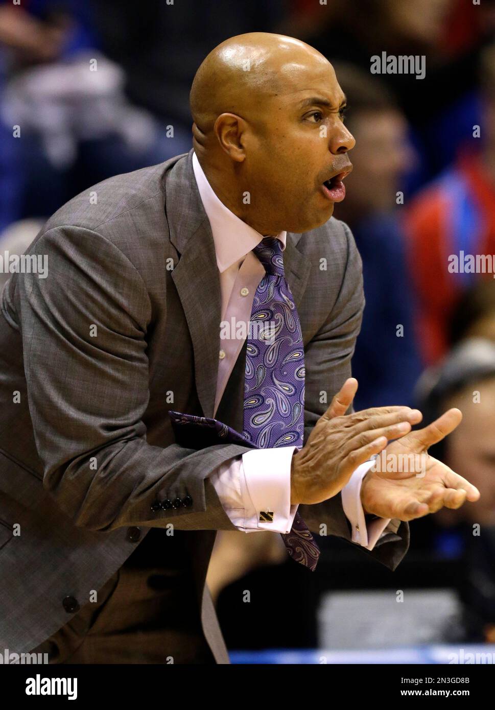 Rider head coach Kevin Baggett yells to his team during the first half ...