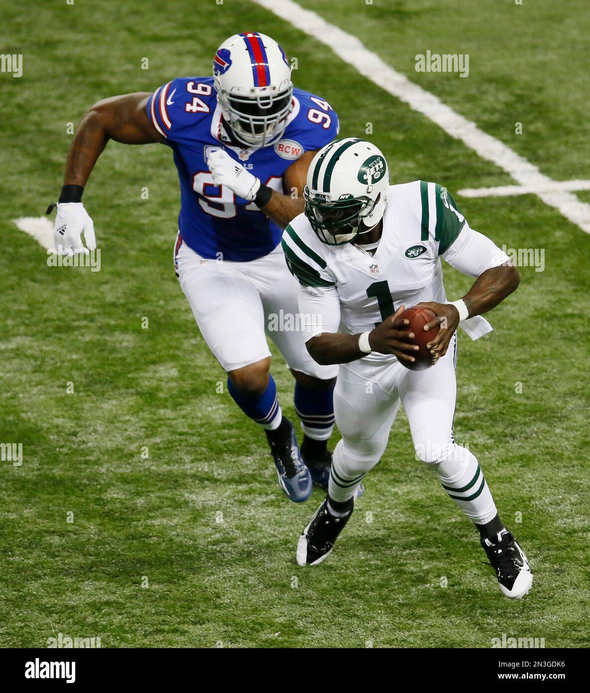 Buffalo Bills defensive end Mario Williams (94) chases New York Jets ...