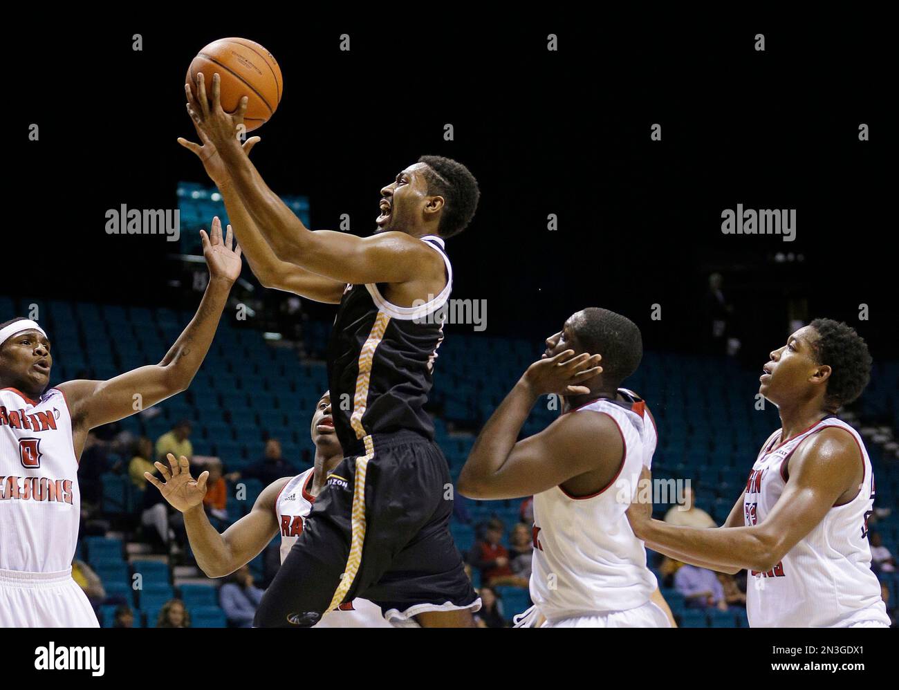 Wisconsin-Milwaukee guard Steve McWhorter (25) goes up for a shot ...