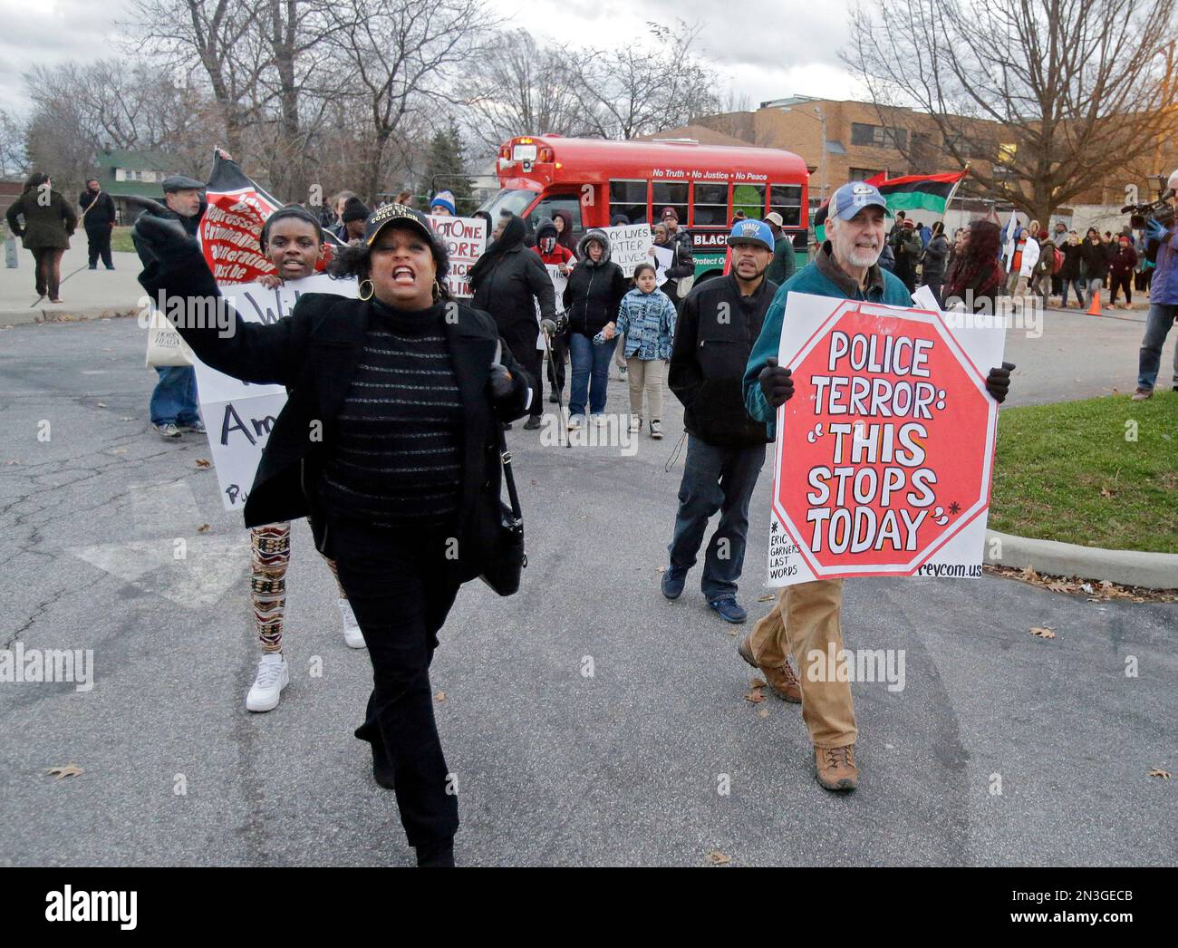 Demonstrators march to protest the shooting of Tamir Rice at Cudell ...