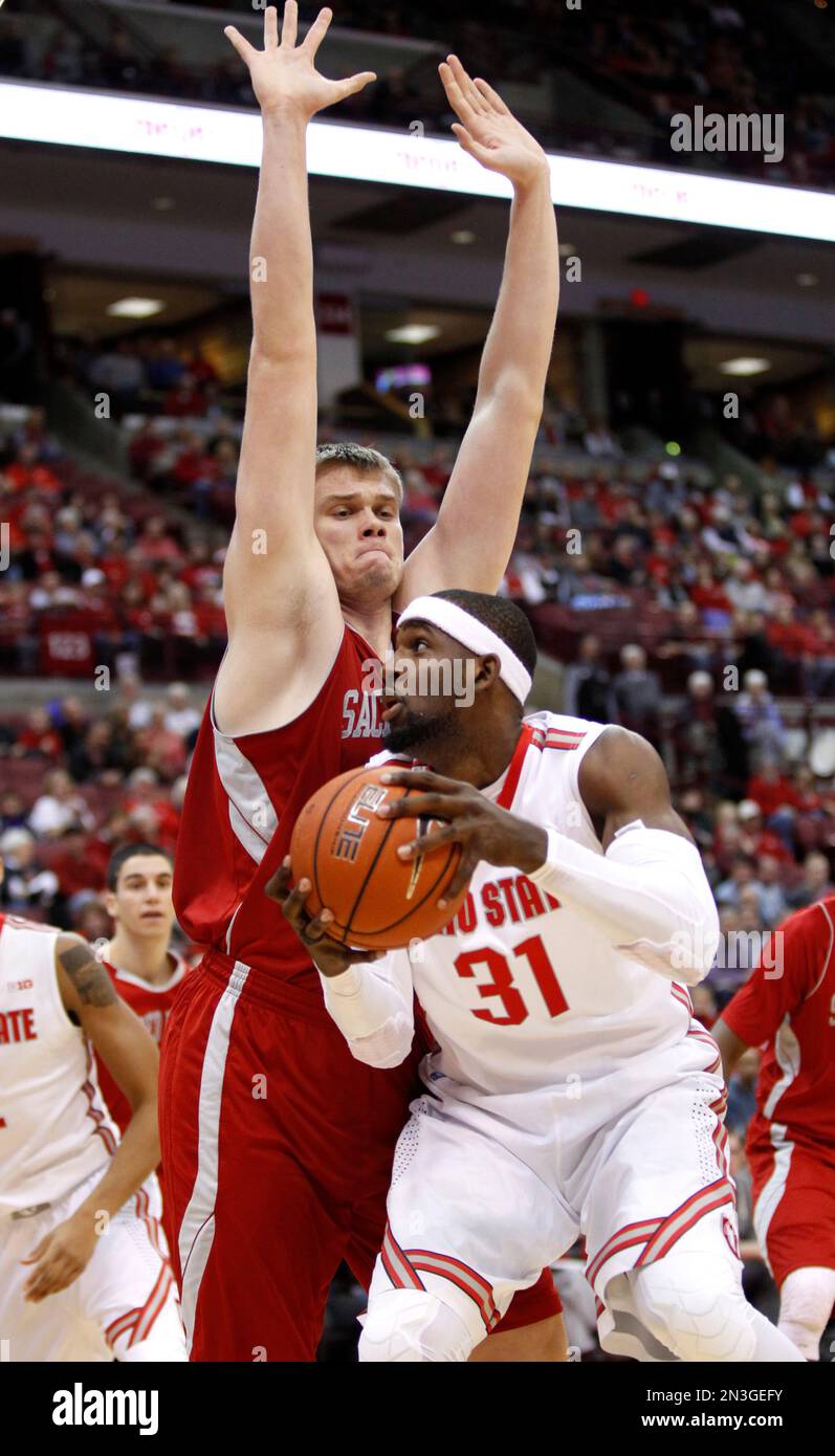 Ohio State's Anthony Lee, right, works against Sacred Heart's Filip ...