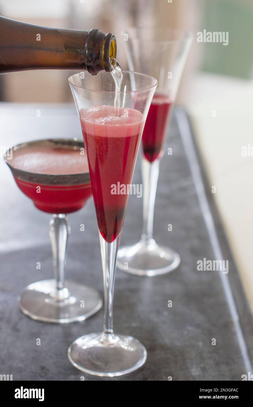 This Nov. 10, 2014 photo shows a ruby spiced bubbles cocktail in ...